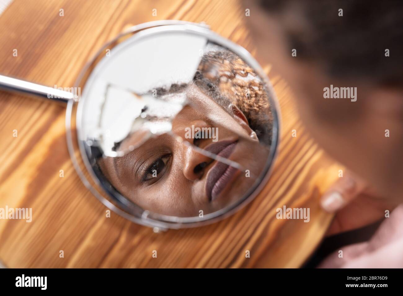Broken mirror face hi-res stock photography and images - Alamy