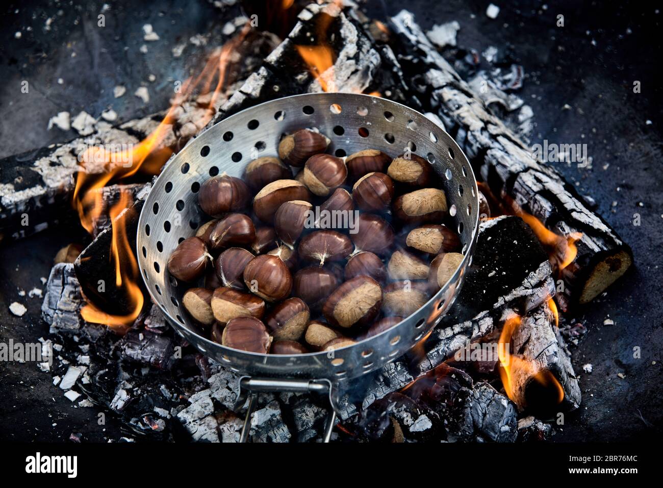 Roasting chestnuts bbq hi-res stock photography and images - Alamy