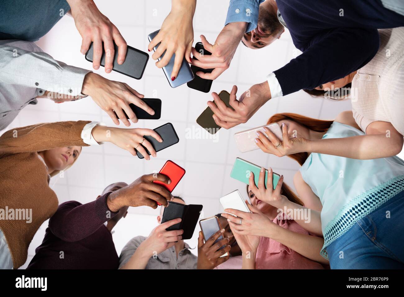 Diverse group people using electronic hi-res stock photography and ...