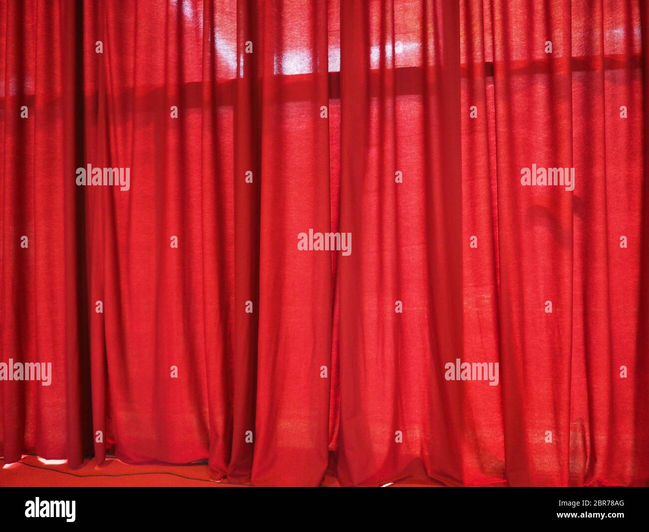 red curtain fabric useful as a background Stock Photo - Alamy