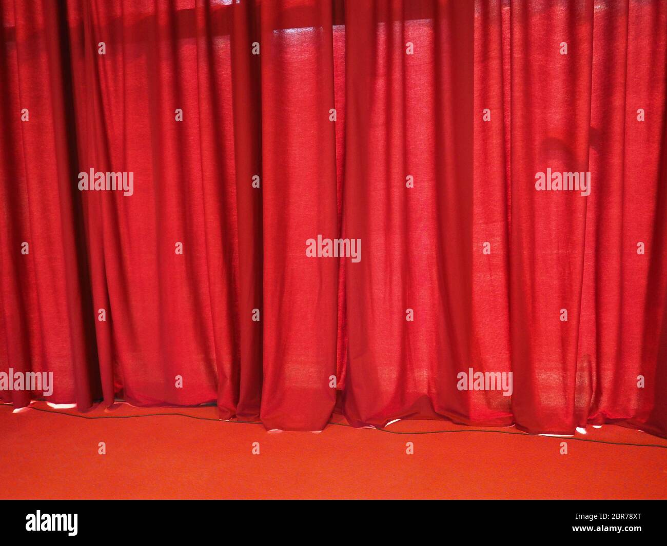 red curtain fabric useful as a background Stock Photo - Alamy