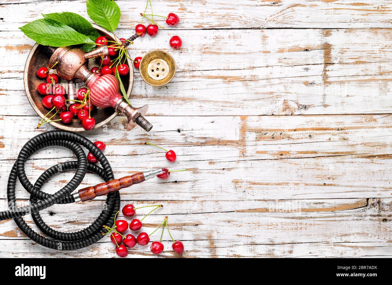 Smoking hookah.Fruit shisha.Eastern smoking nargile with cherry flavor ...