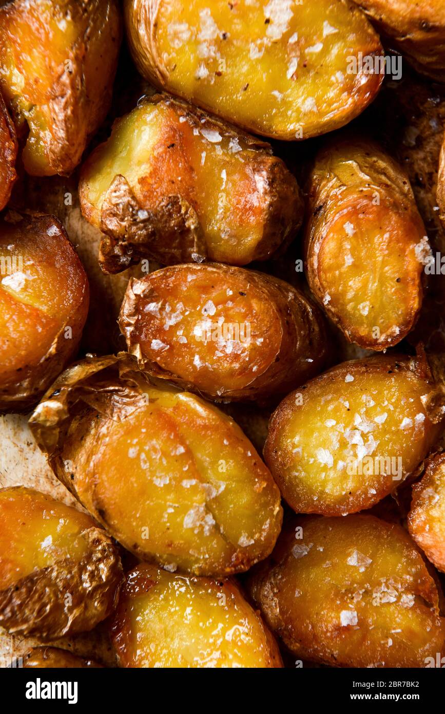 Roasted Potatoes with a sprinkling of sea salt Stock Photo - Alamy
