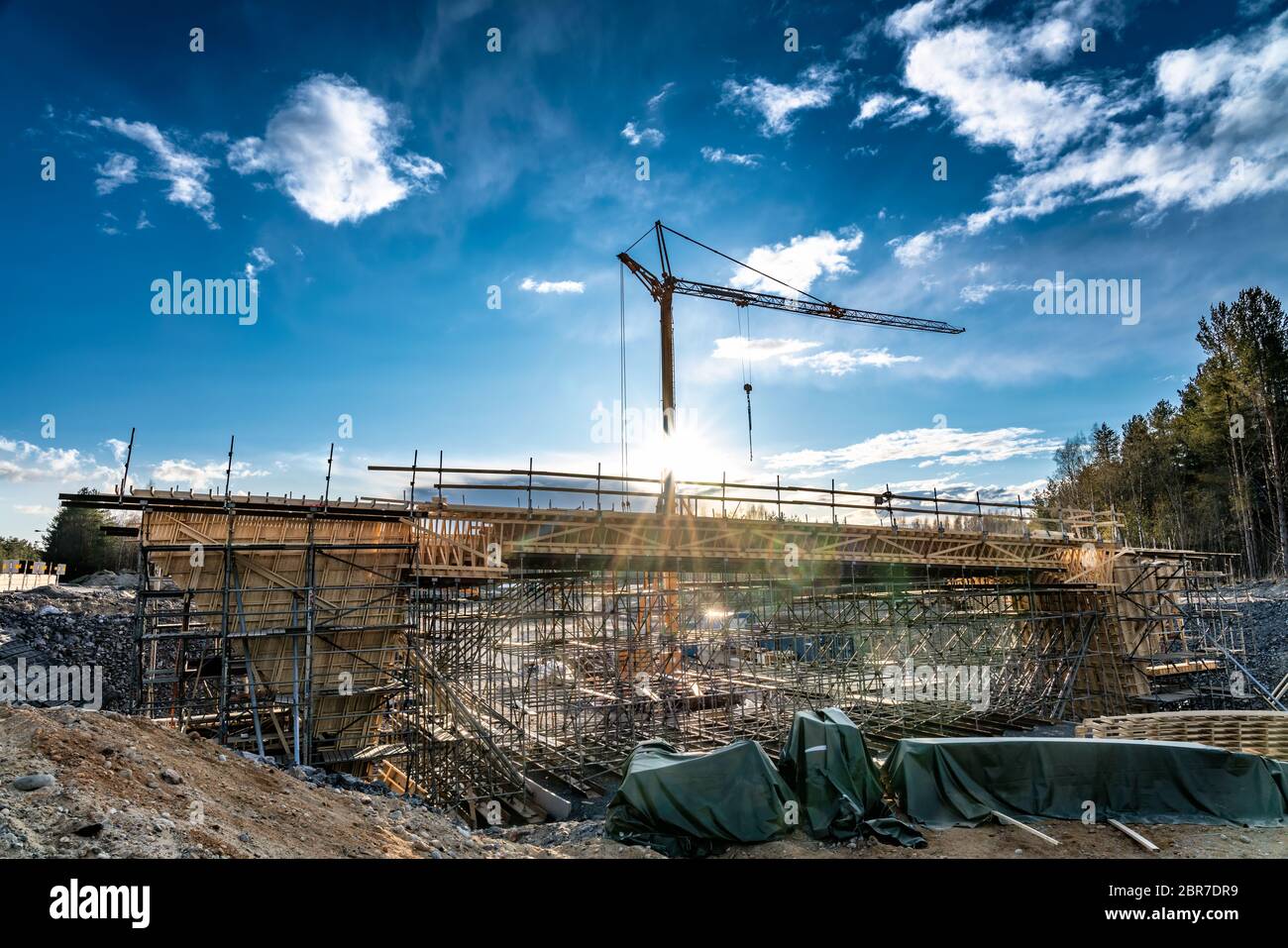 Close up photo of new bridge building site with timbering construction ...