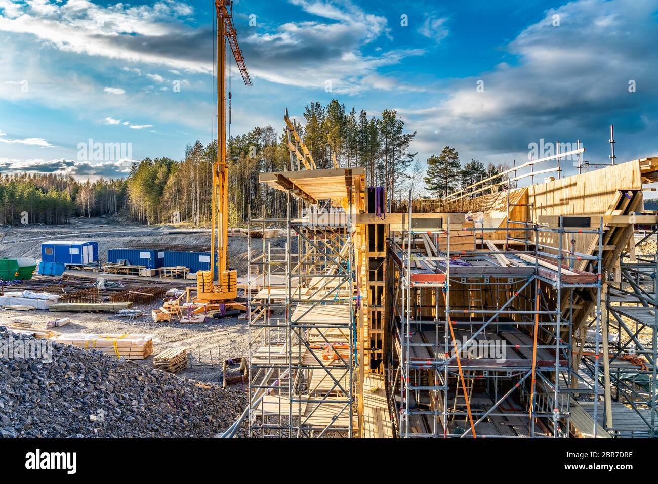 Close up photo of new bridge building site with timbering construction ...