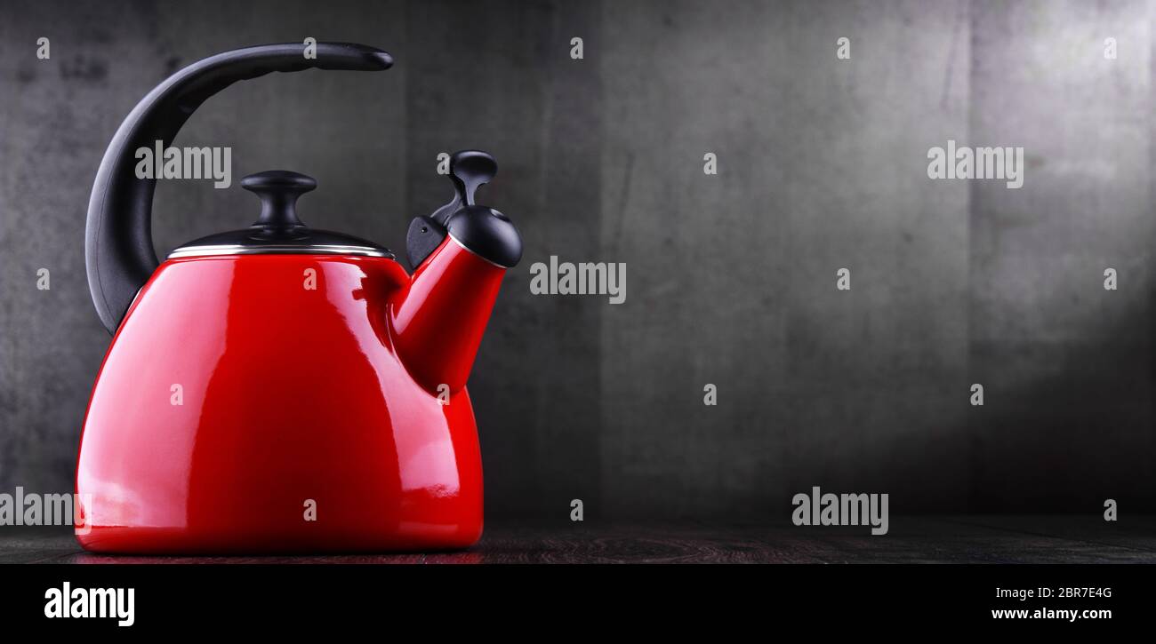 Traditional stainless steel stovetop kettle with whistle of two litres ...