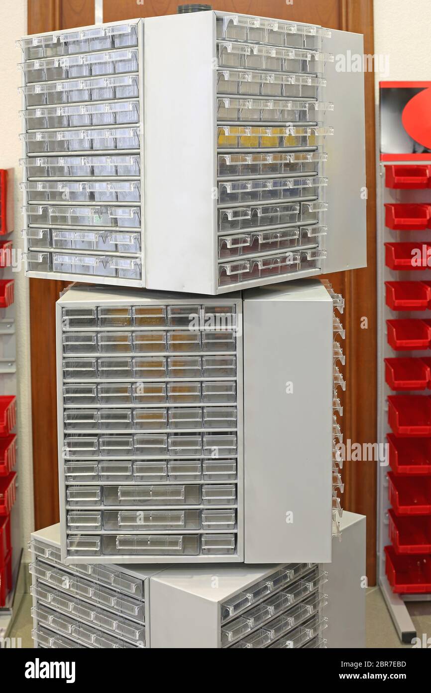 Small Transparent Drawers for Parts in Tower Rack Stock Photo - Alamy