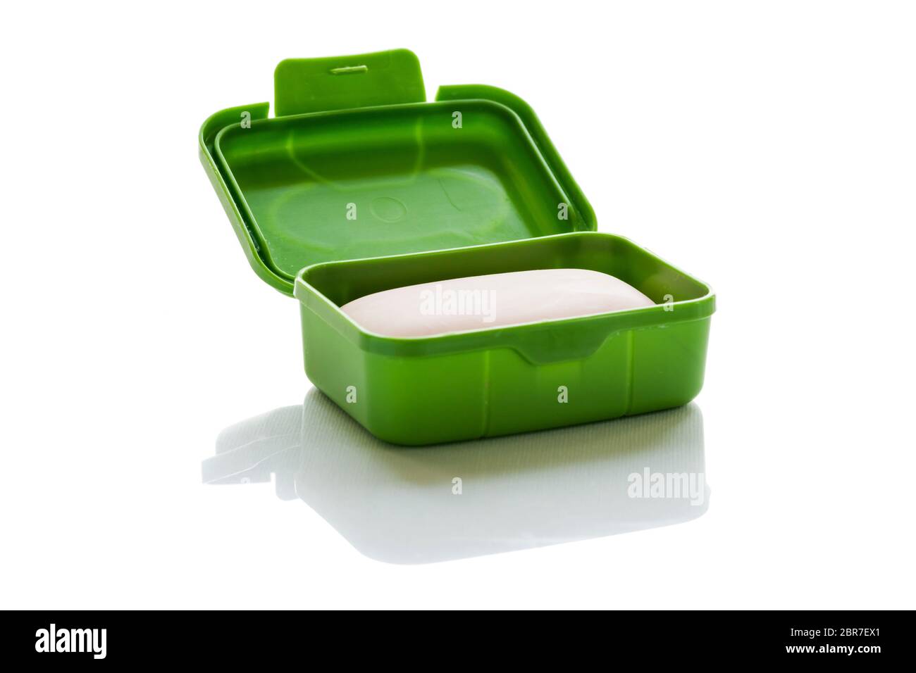 Open green soap box with internal soap isolated on white Stock Photo ...