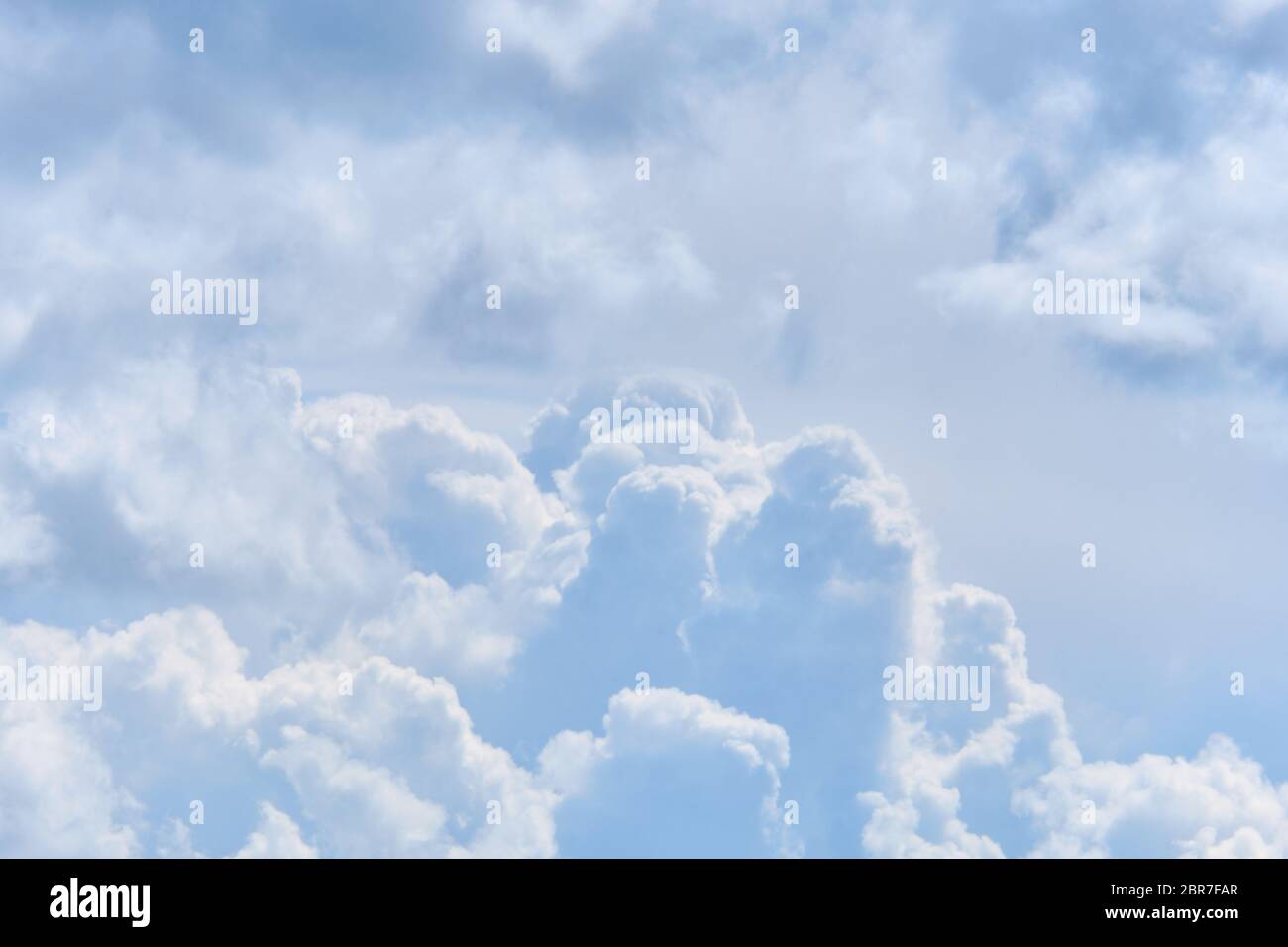 Thick white clouds in the sky at the level of an airplane in flight ...