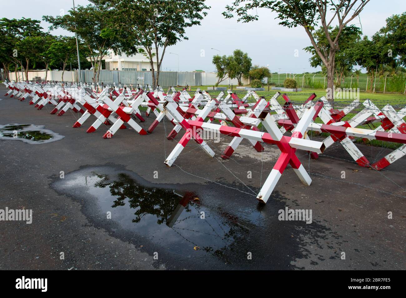Barbed wire fence block the way Stock Photo - Alamy