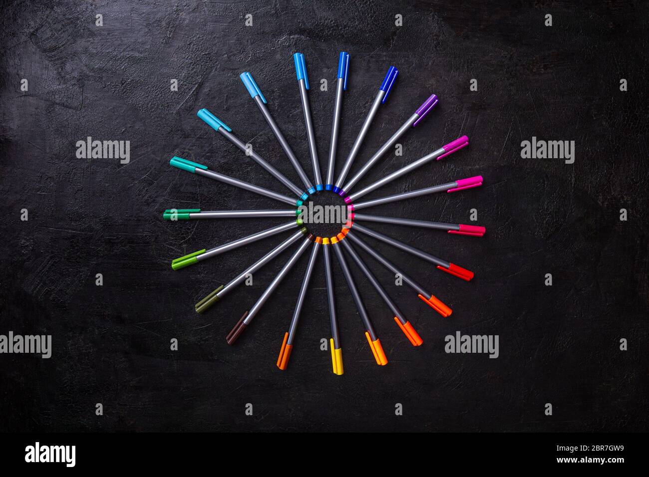A complete collection of capped fineliners on black background Stock ...