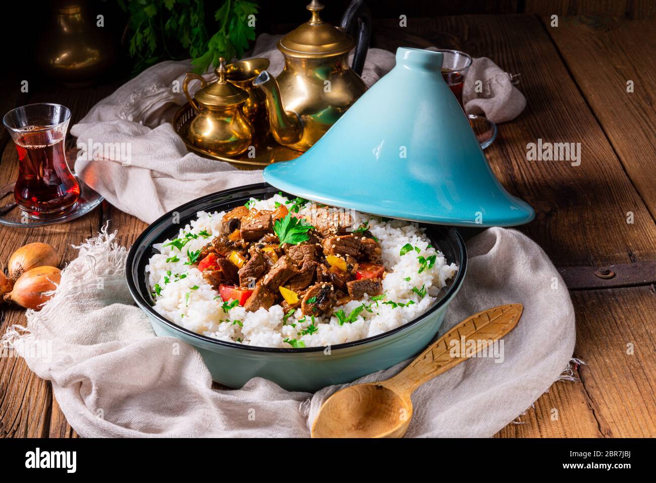 Tajin beef stew with rice paprika and sesame seeds Stock Photo - Alamy