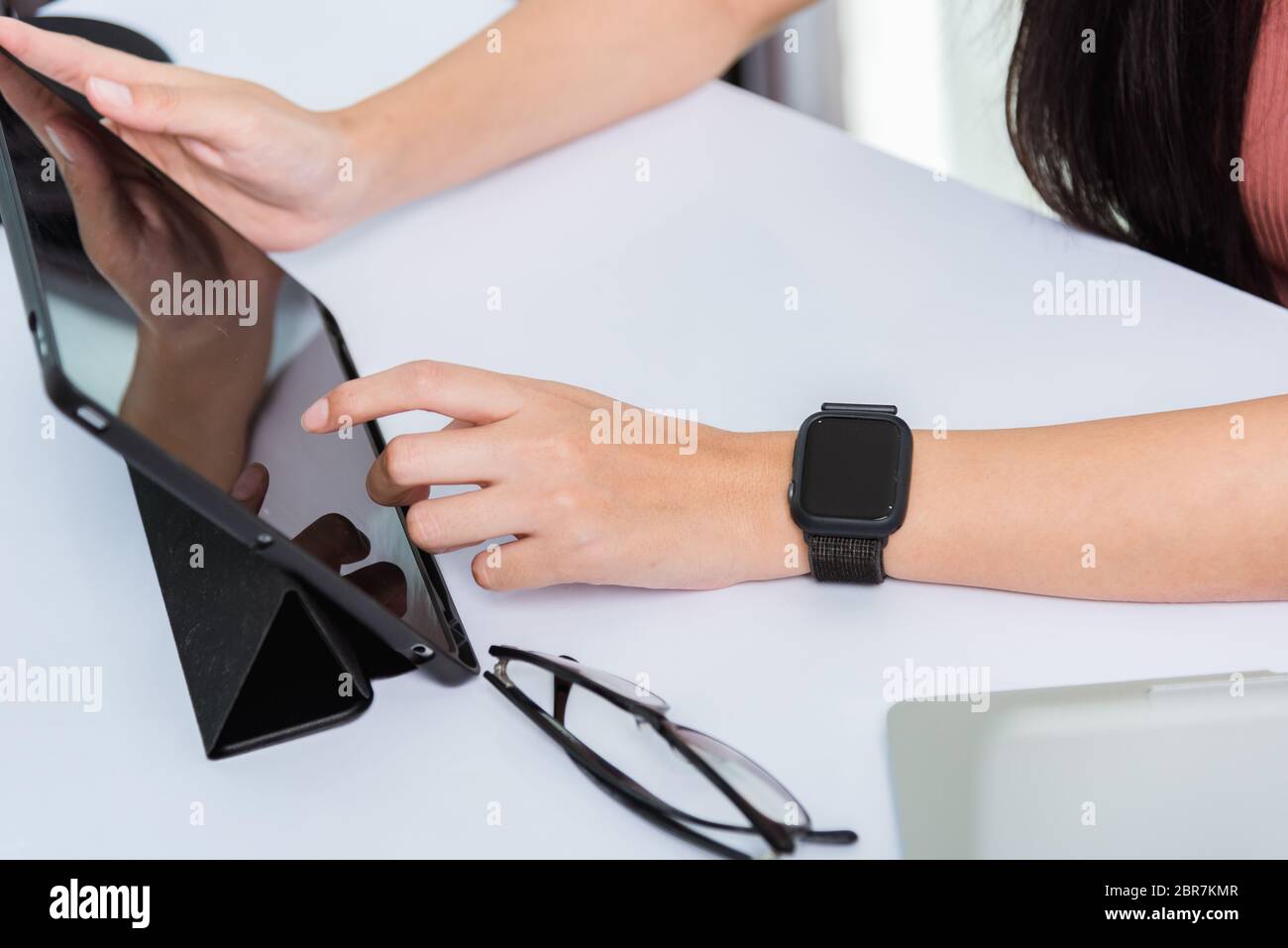 Work from home, Happy Asian young businesswoman use hand finger touch ...