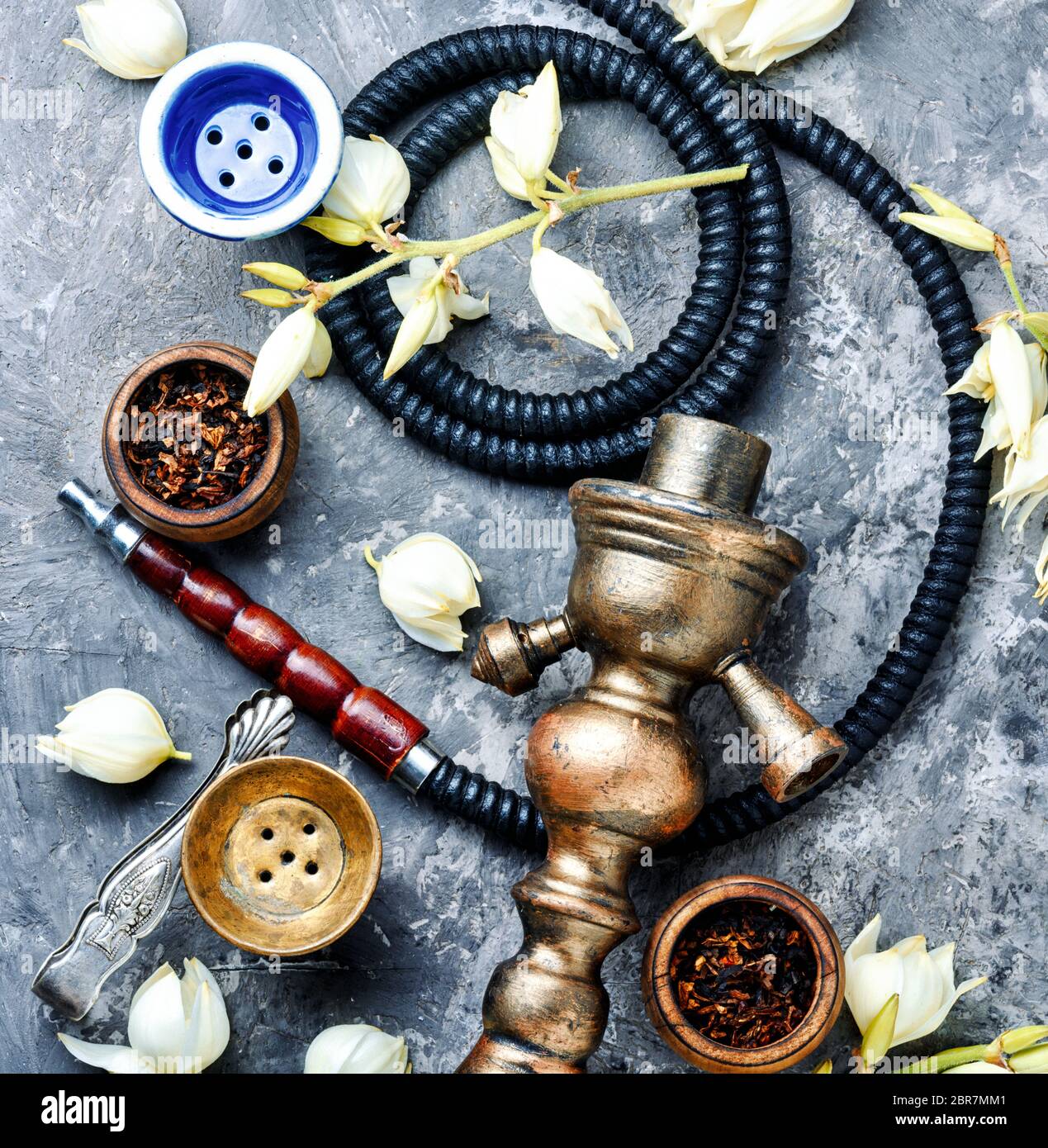 Smoking hookah with floral tobacco flavor.East kalian.Tobacco pipe and ...