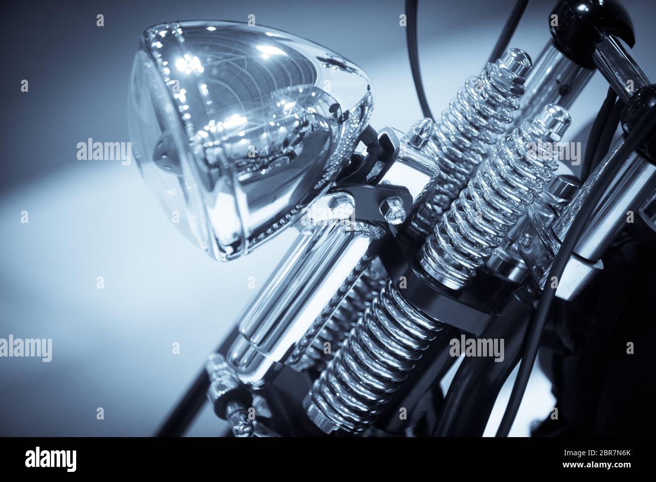 Close up shot of a classic motorcycle chrome headlight and front ...