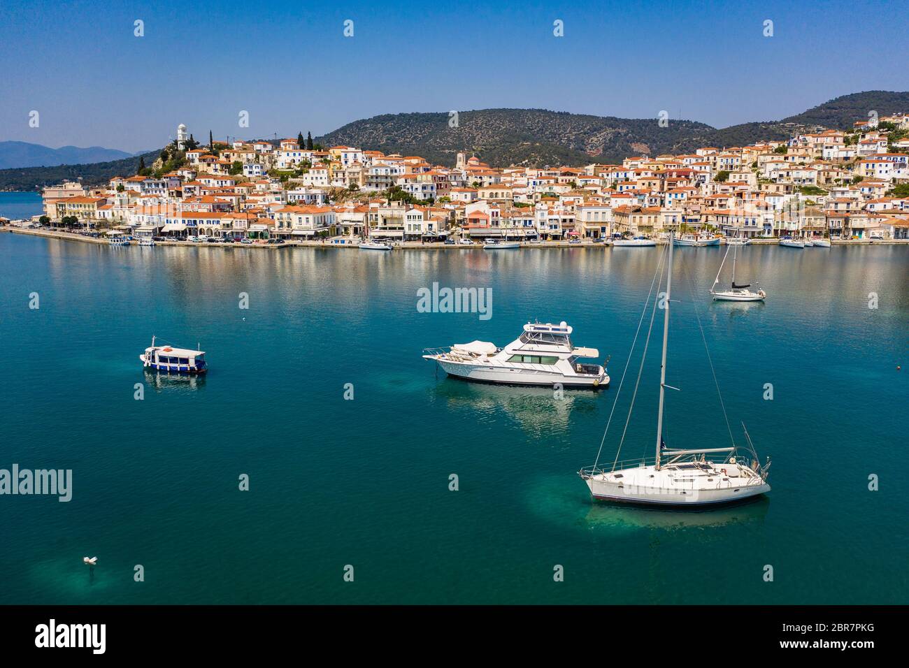Top aerial view of the Poros island Sea harbor, Aegean sea, Greece ...