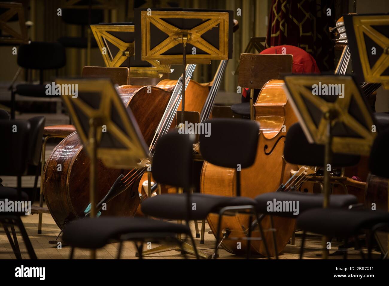 Color image of some orchestra empty seats on a stage Stock Photo - Alamy