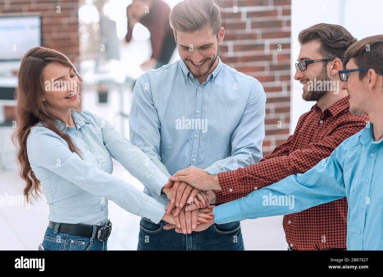 Group of people hands together partnership teamwork Stock Photo - Alamy