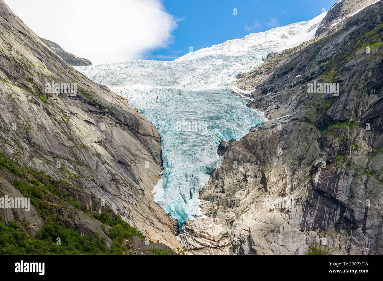Briksdal or Briksdalsbreen glacier with melting blue ice, Norway nature ...