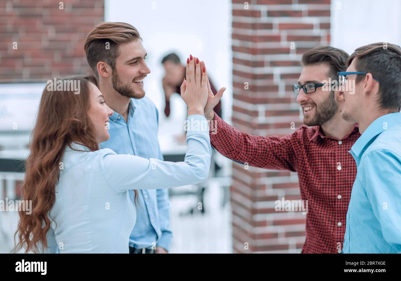 Business people giving five after hi-res stock photography and images ...