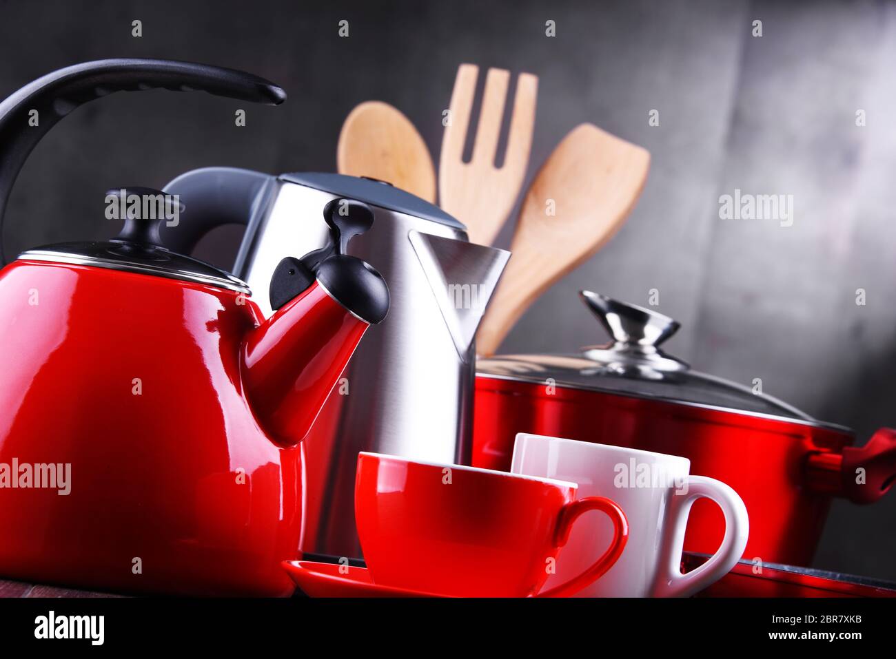 Composition with kitchen vessels, kettles and cups Stock Photo - Alamy