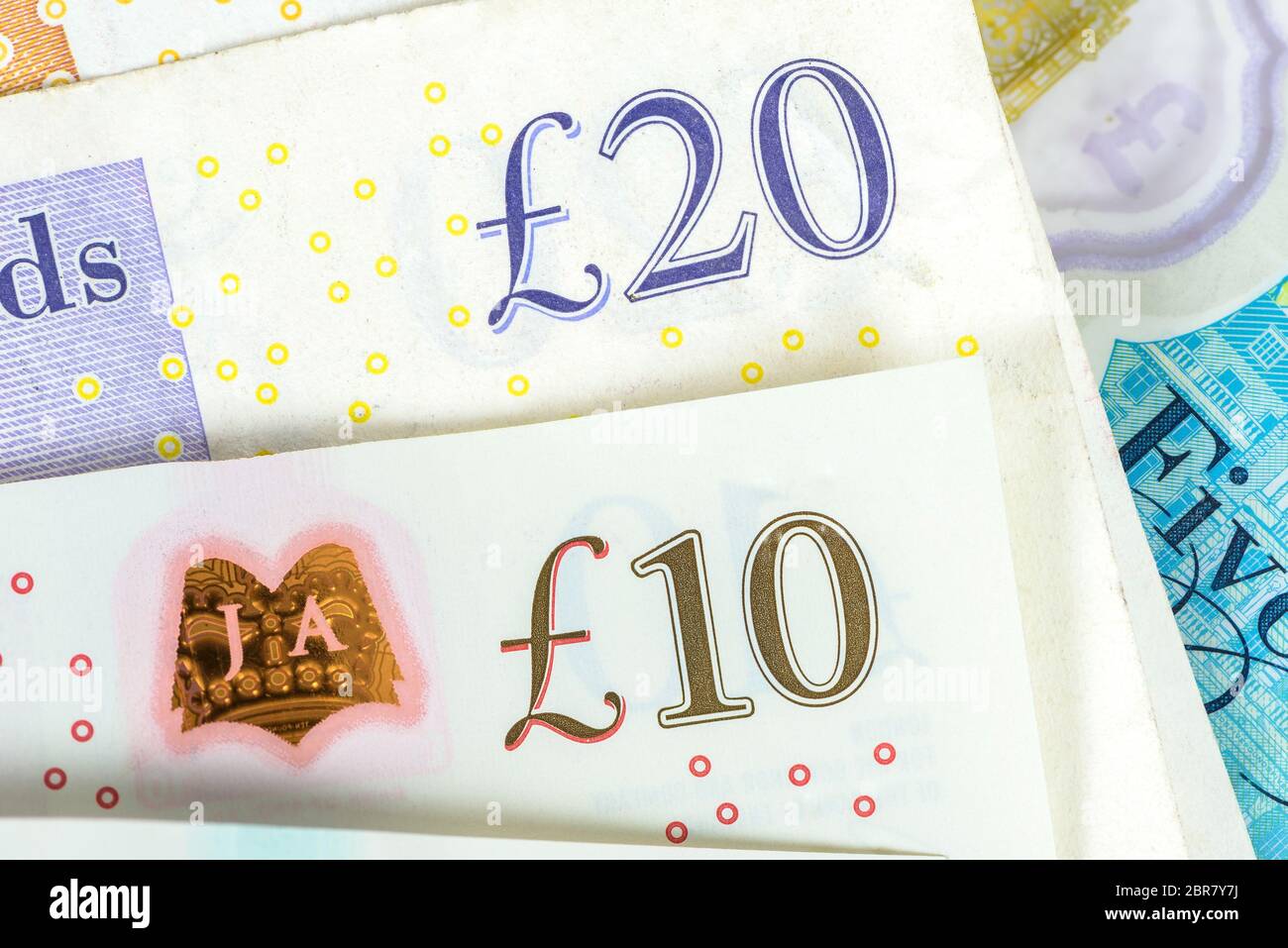 Closeup of 10 and 20 pounds banknotes. Financial background Stock Photo ...
