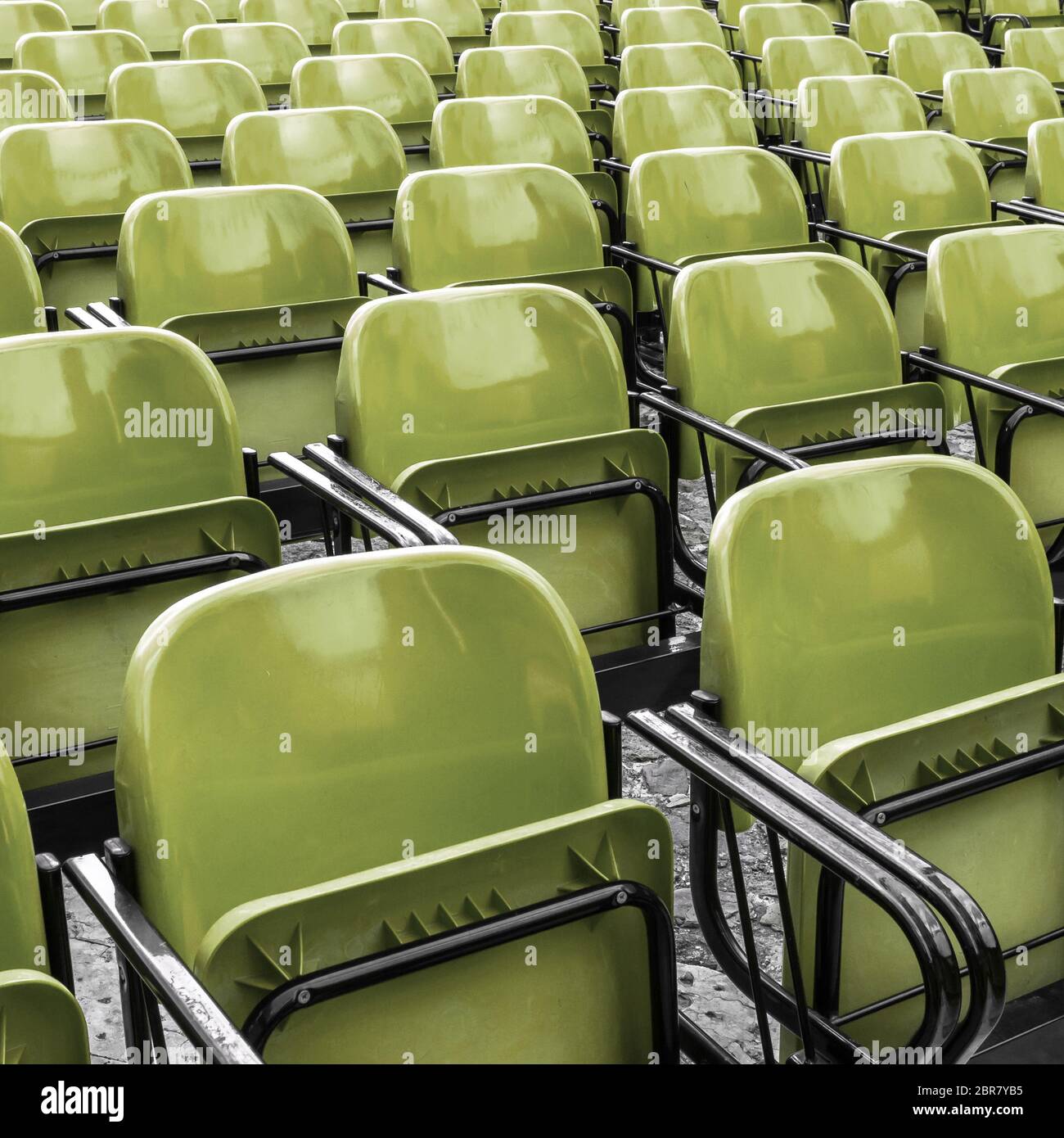 Empty plastic green chairs hi-res stock photography and images - Alamy
