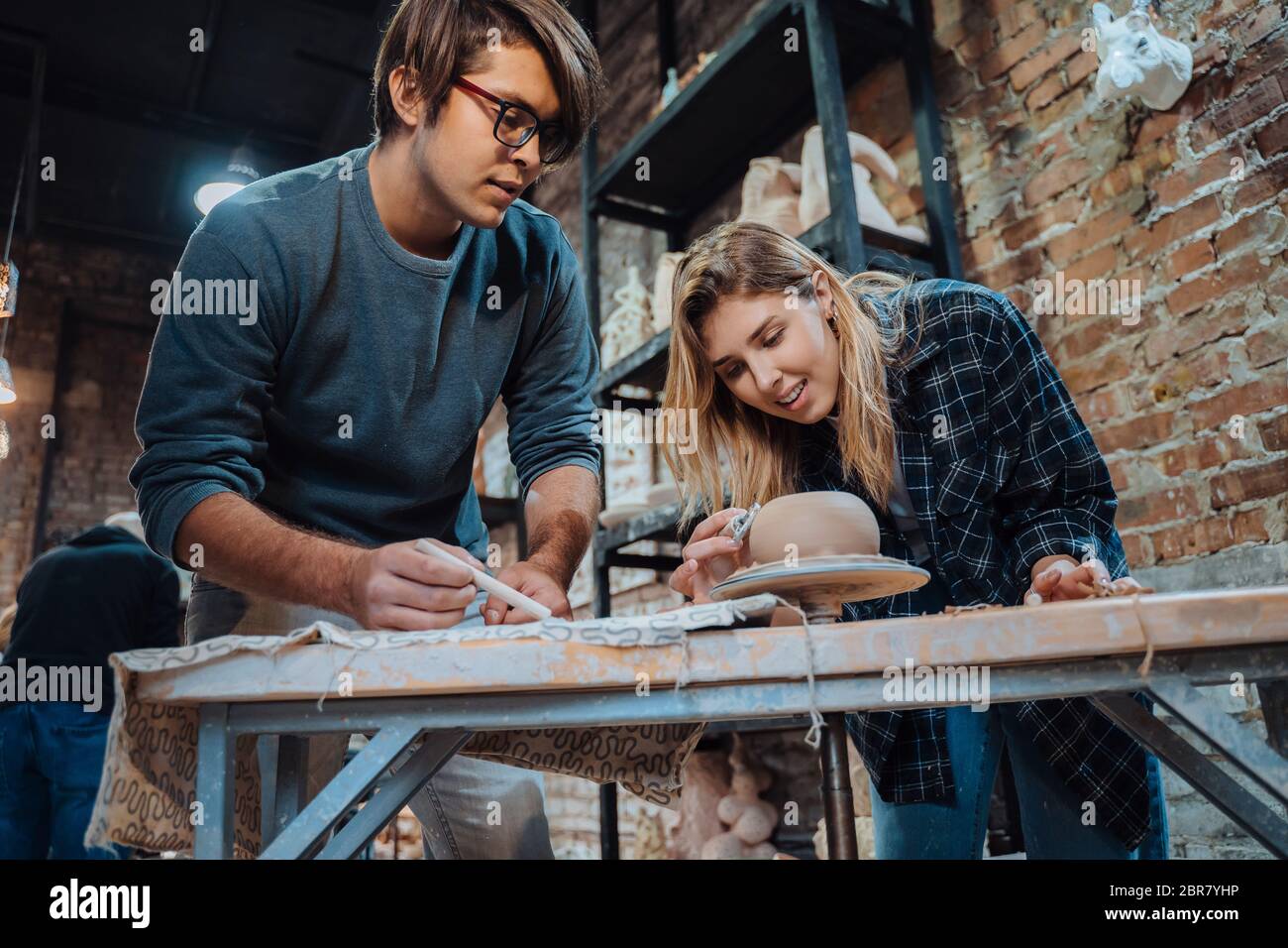 Making a handmade clay pot. Pottery lesson, hobby Stock Photo - Alamy