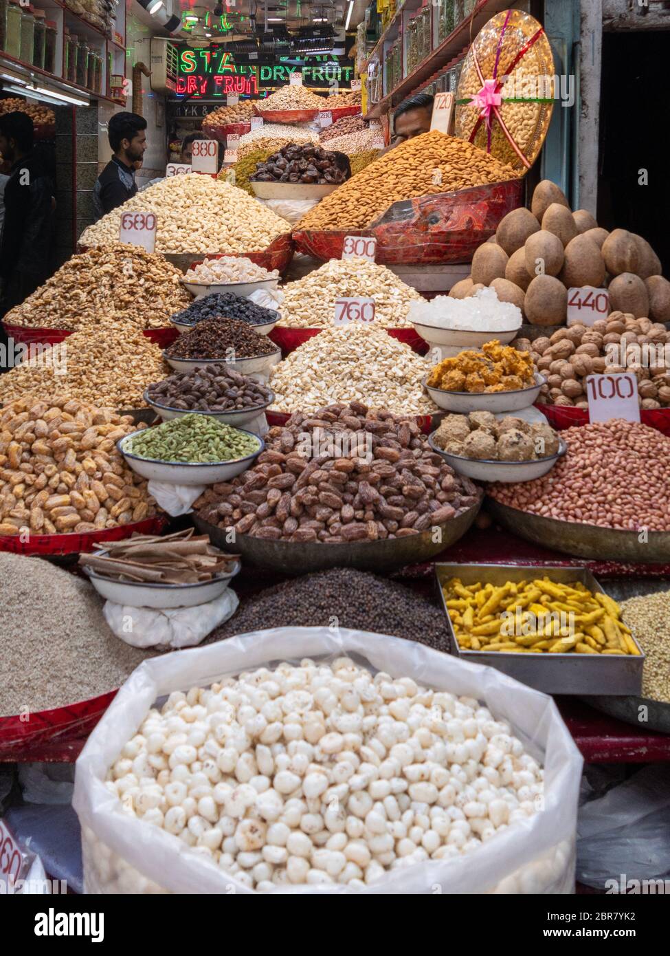 DELHI, INDIA - MARCH 14, 2019: a vendor selling nuts at the spice ...