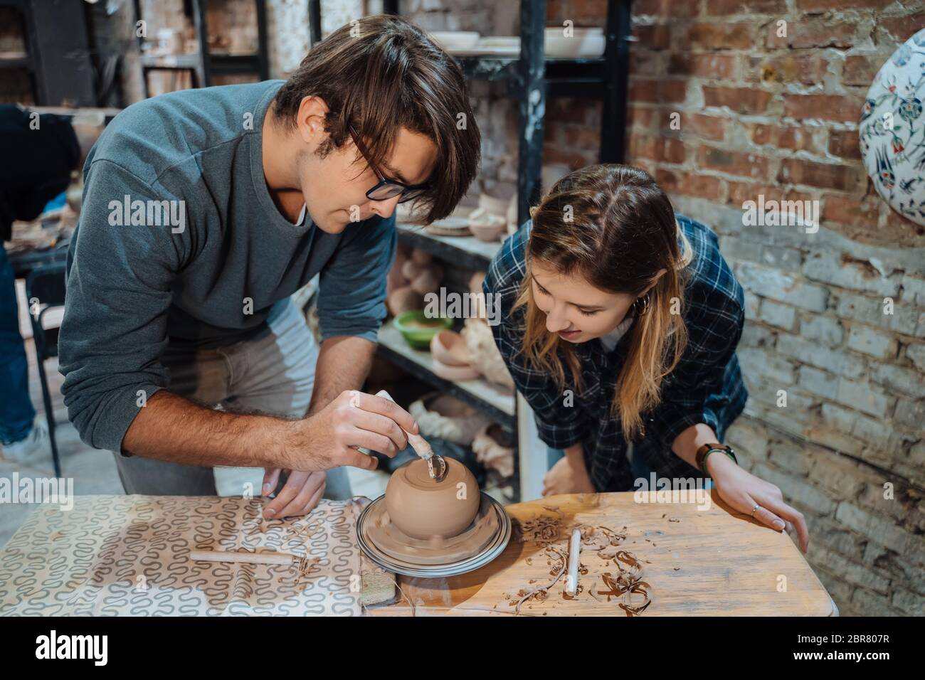 Making a handmade clay pot. Pottery lesson, hobby Stock Photo - Alamy