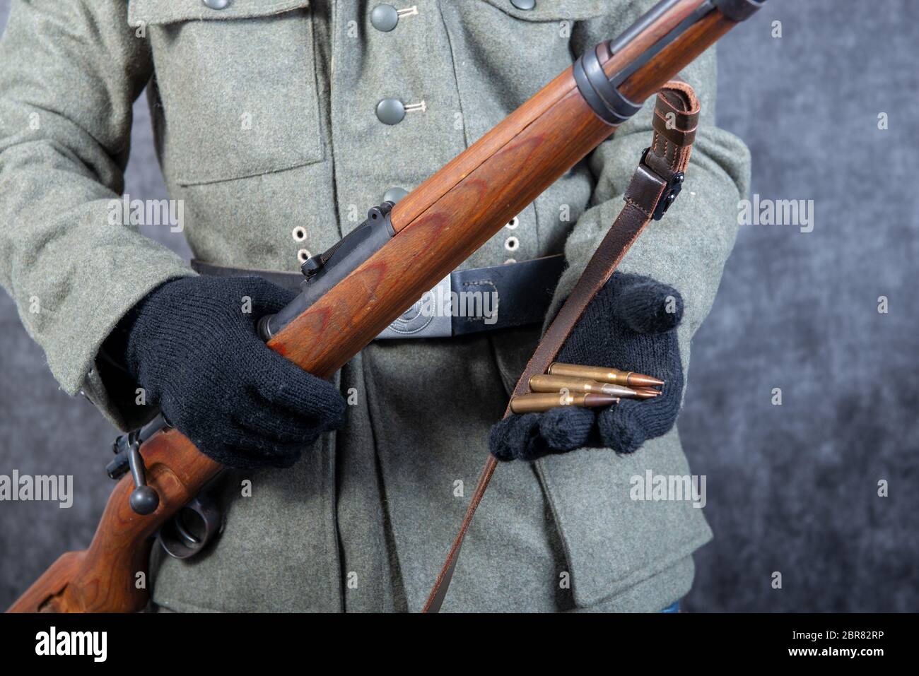 a WW II German soldier with rifle and ammunition Stock Photo - Alamy