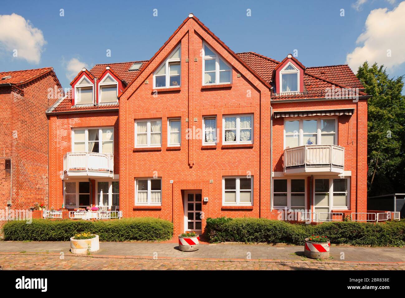 Modern residential building made of brick, multi-family house ...