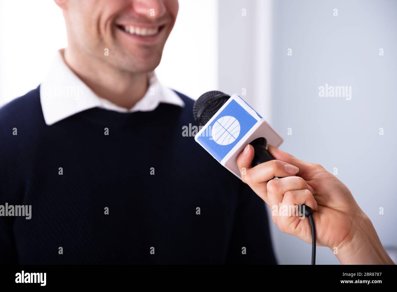 Woman reporter interview in office hi-res stock photography and images ...