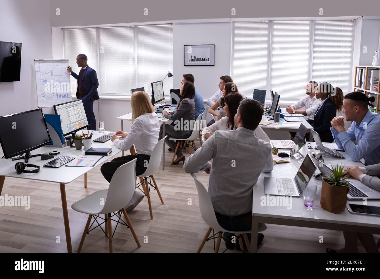 Meeting african presenter hi-res stock photography and images - Alamy