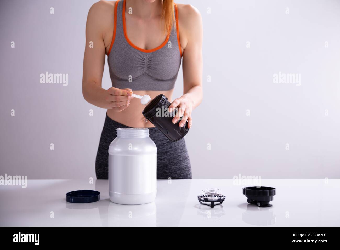 Woman making protein shake hi-res stock photography and images - Alamy