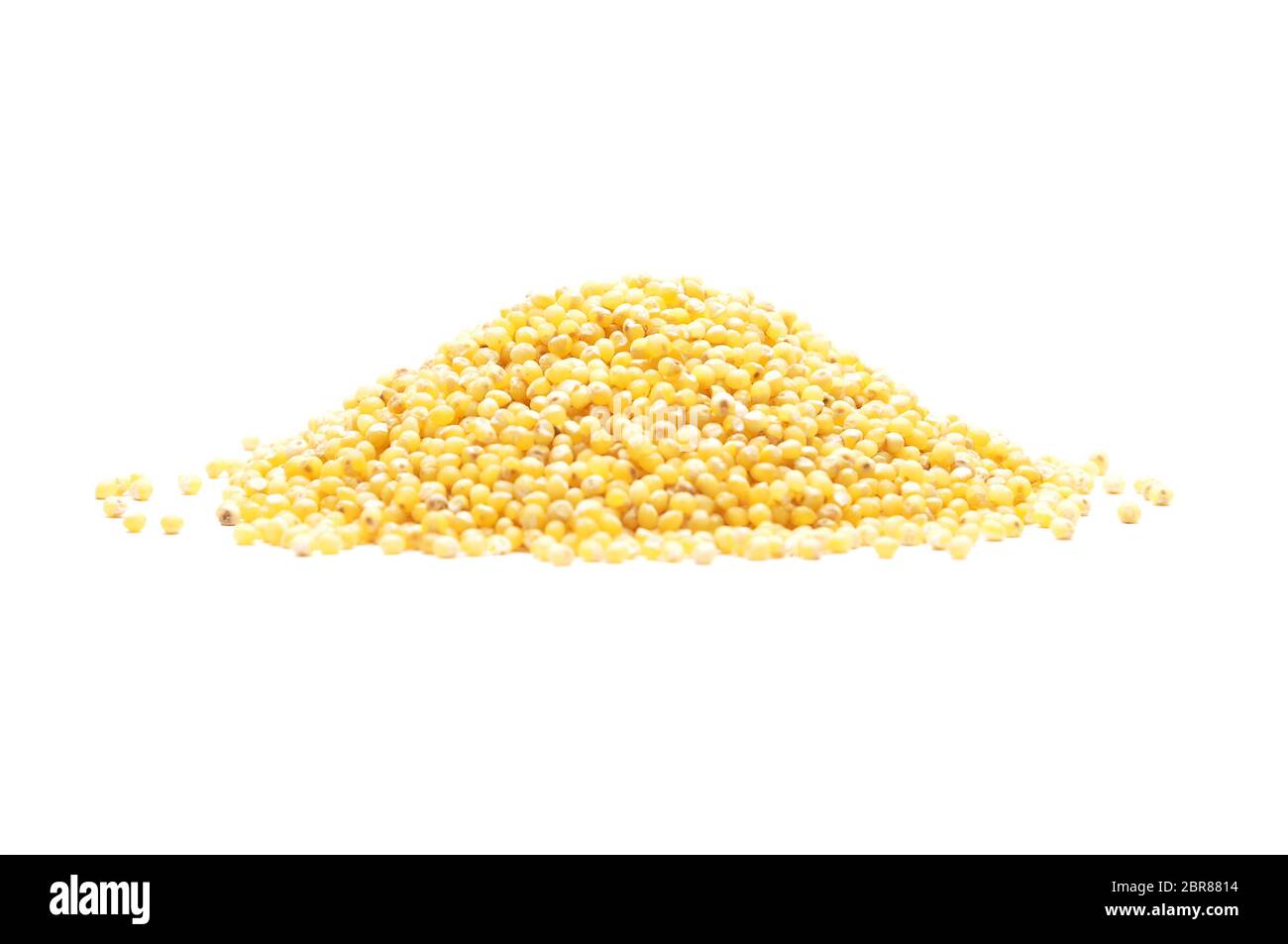 Raw millet on white background Stock Photo - Alamy
