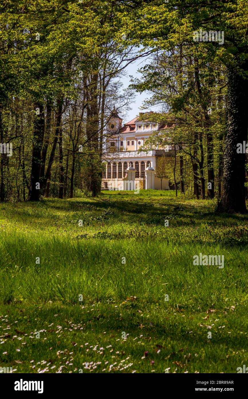 Old trees, gazebo and ruins of old chapel in English park of baroque ...
