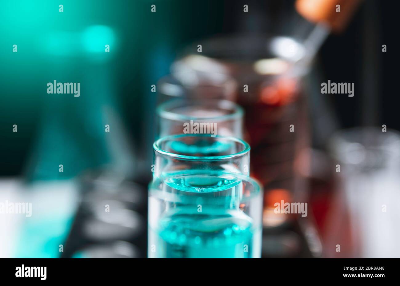 Glass laboratory chemical test tubes with liquid for analytical ...