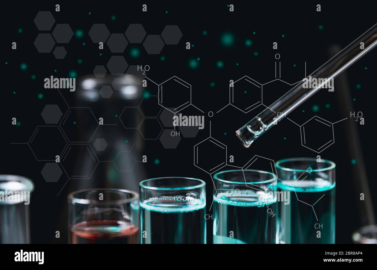 Glass laboratory chemical test tubes with liquid for analytical ...