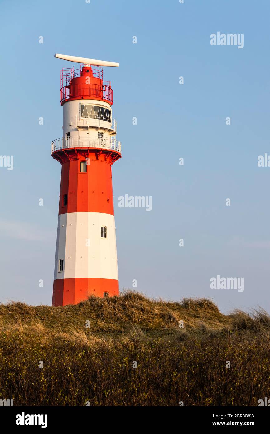 Red and white are the colors of the small lighthouse on Borkum Stock ...
