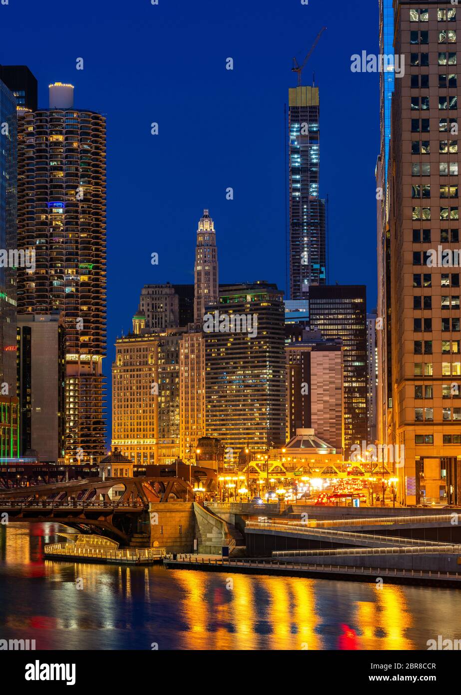 City of Chicago downtown and Chicago River sunset night in Chicago ...