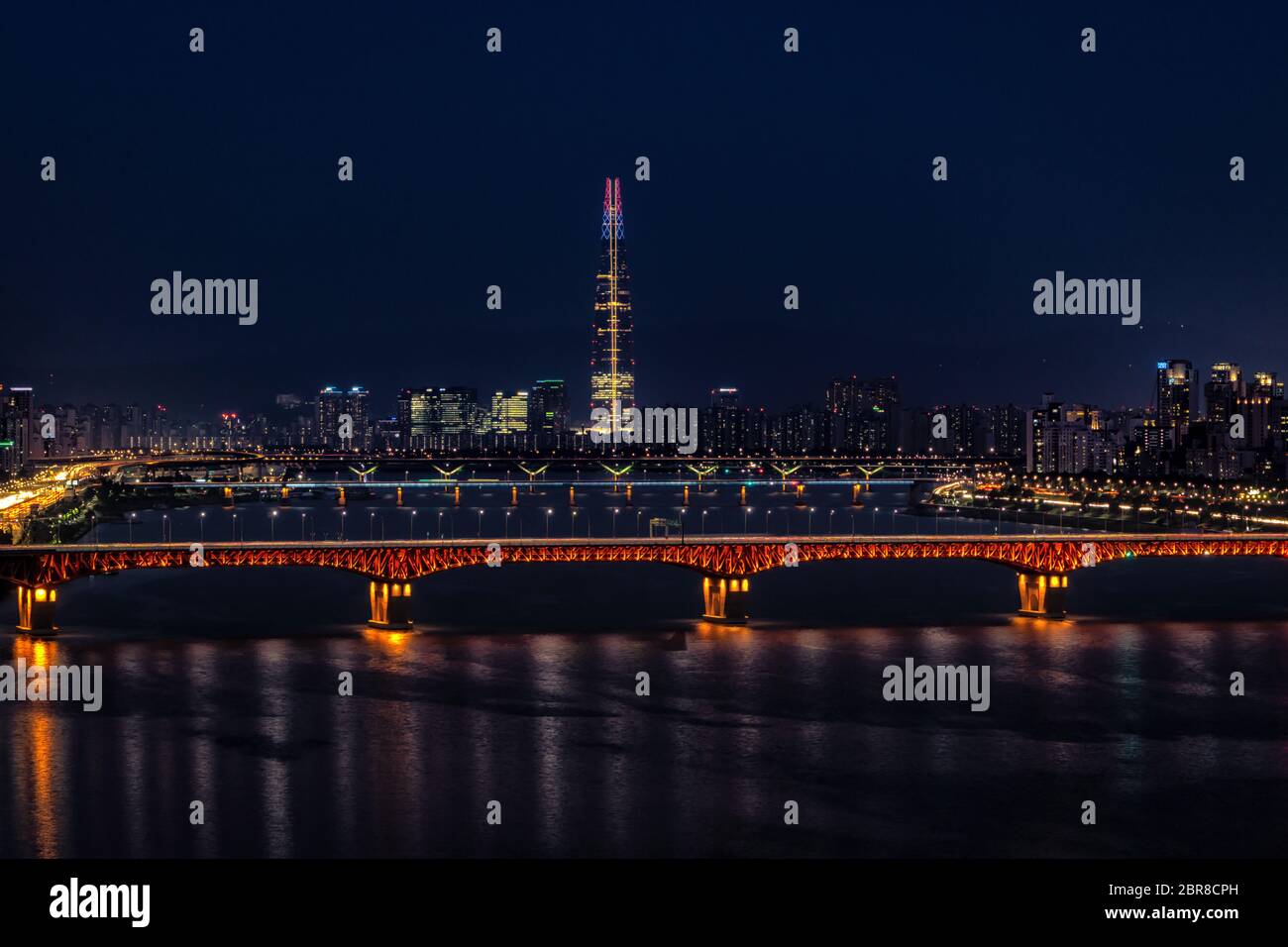 Lotte tower and seungsu bridge lit up taken at night. The view of ...