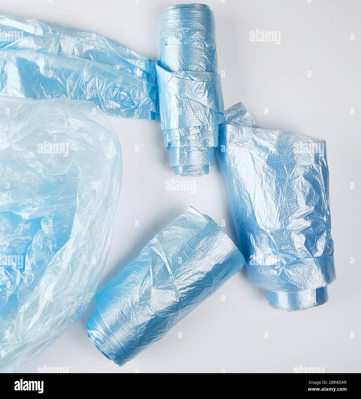 blue plastic bags for garbage on a white background, top view Stock ...