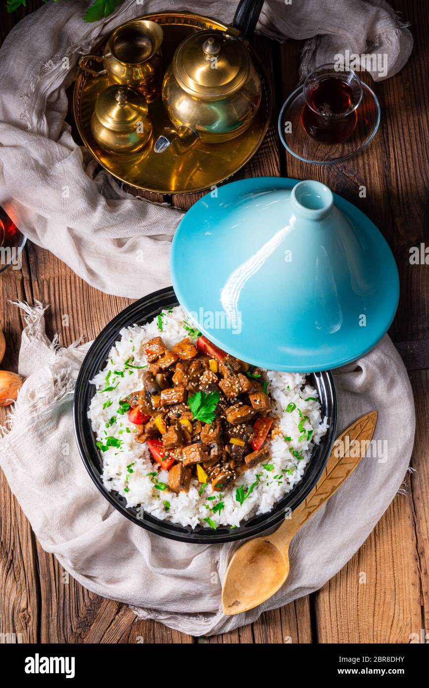 Tajin beef stew with rice paprika and sesame seeds Stock Photo - Alamy