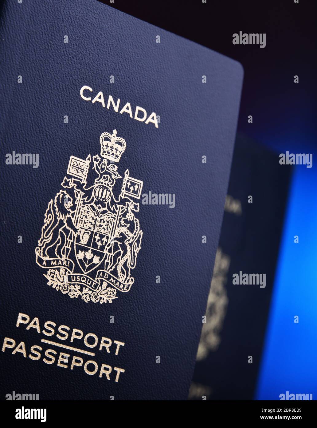 Composition with two Canadian passports Stock Photo - Alamy