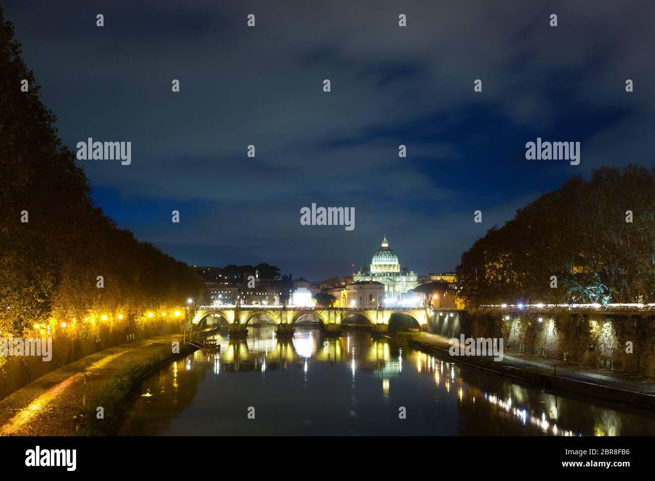 Night scene of Rome, Tevere river with Saint Peter basilica in ...