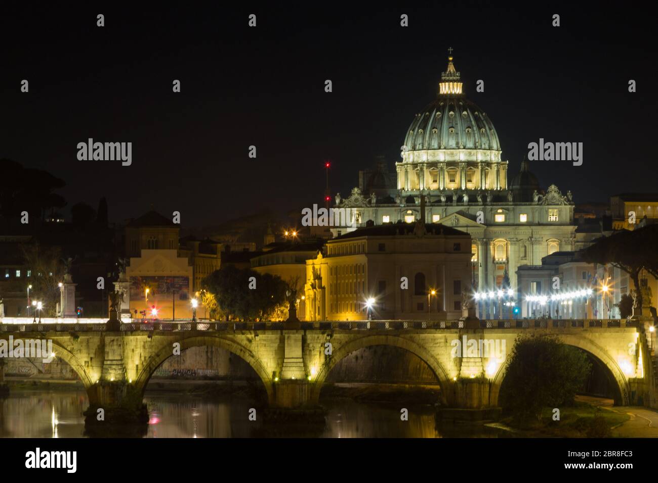Night scene of Rome, Tevere river with Saint Peter basilica in ...