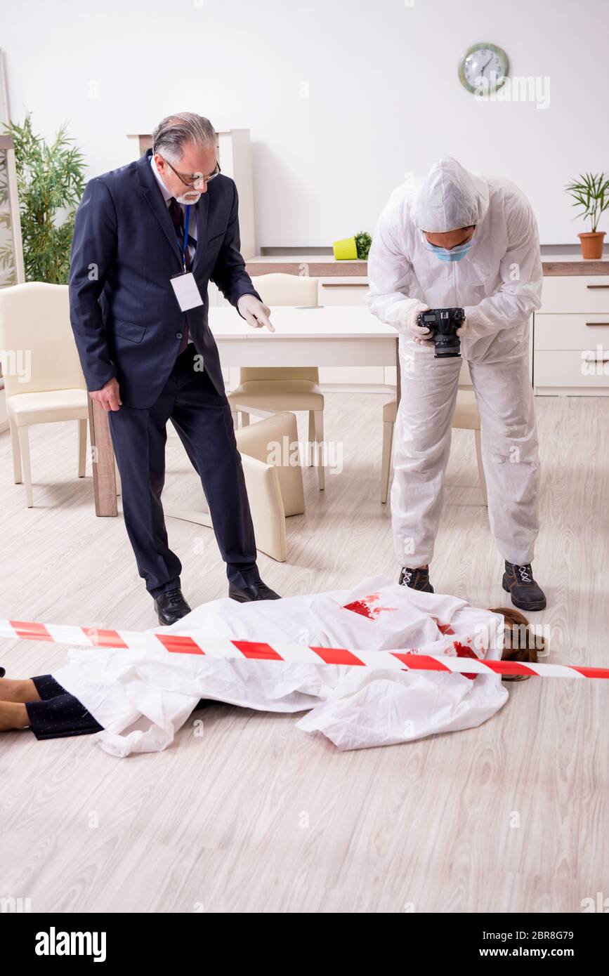 Forensic experts at the crime scene at home Stock Photo - Alamy