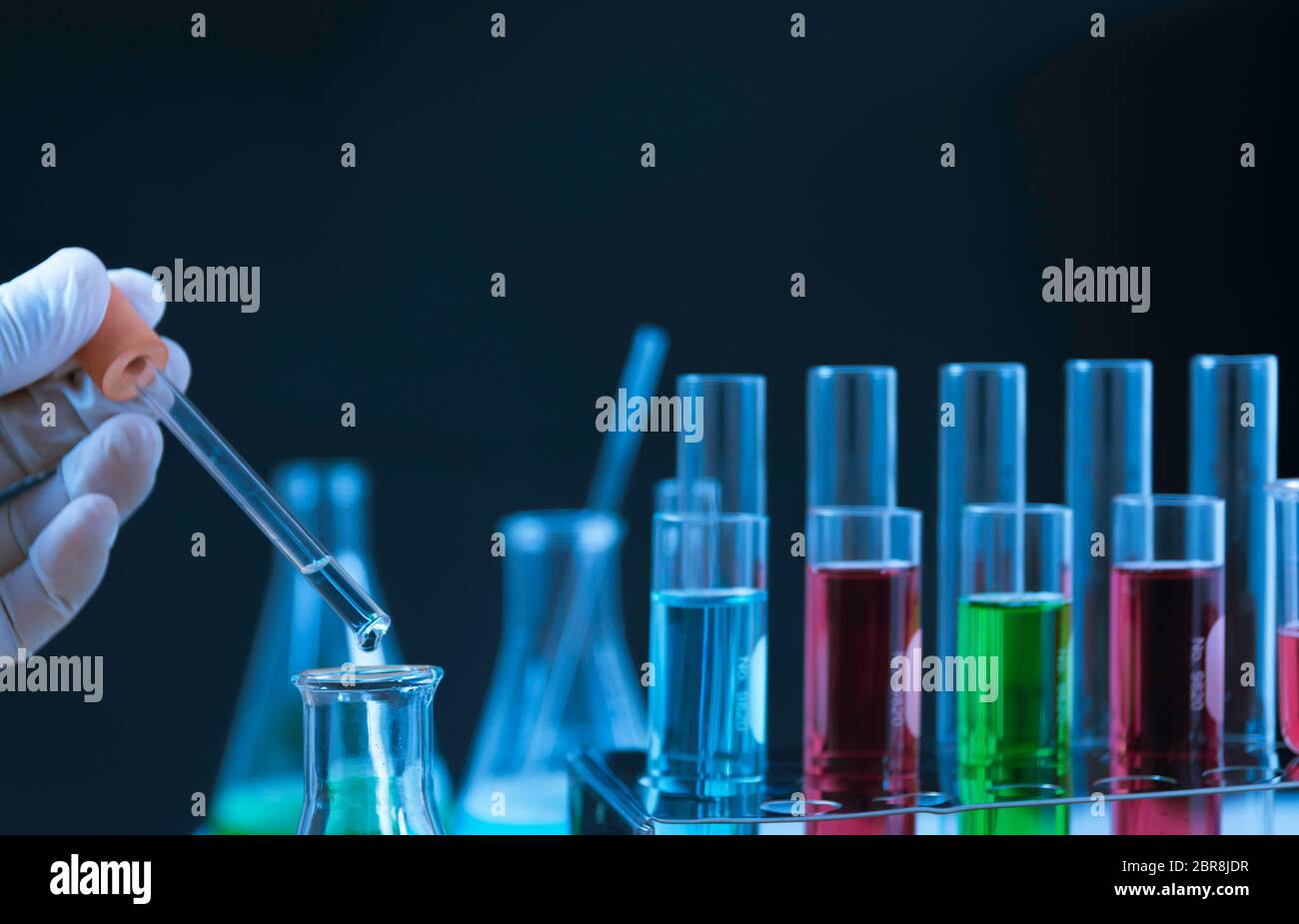 Glass laboratory chemical test tubes with liquid for analytical ...