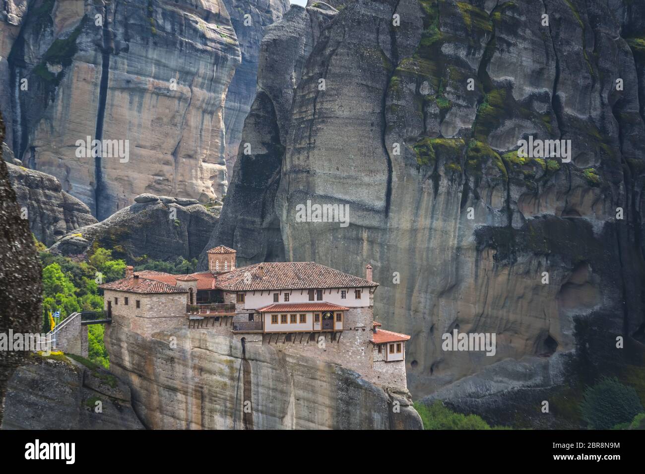 View of the stunningly located Roussanou monastery in Meteora valley ...